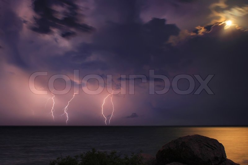 Severe thunderstorm over the ocean. ... | Stock image | Colourbox