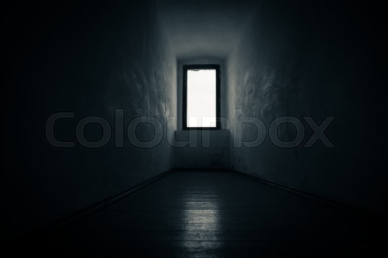 Mysterious window lit with white light ... | Stock image | Colourbox