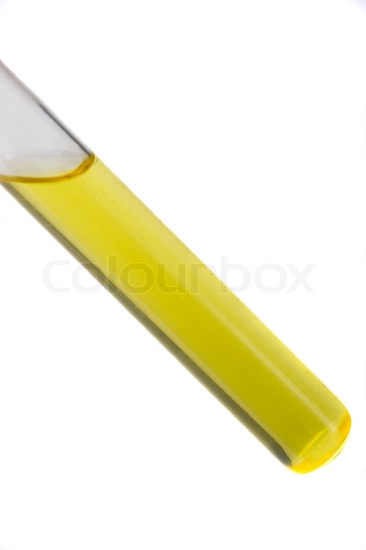Yellow test tube filled with fuel | Stock image | Colourbox