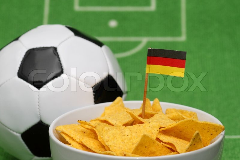 Soccer ball with crispy snacks in a ... | Stock image | Colourbox