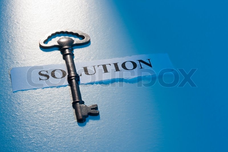 A key laying on a piece of paper with ... | Stock image | Colourbox