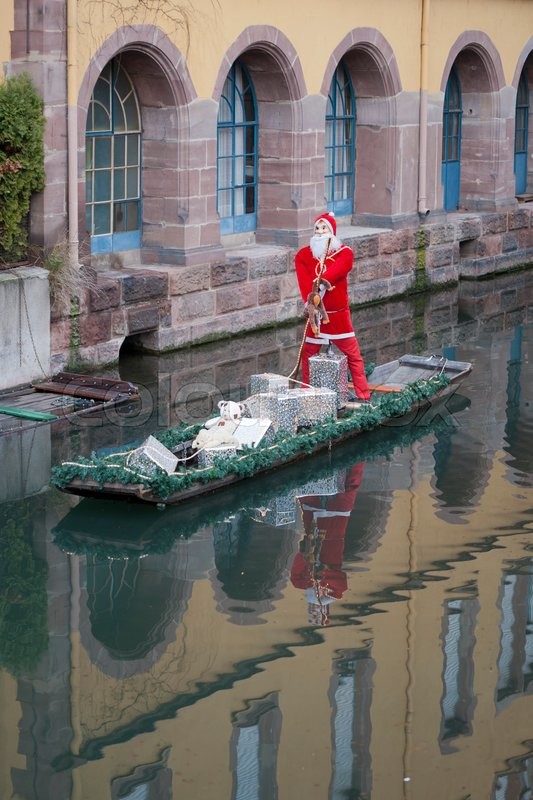 Santa claus on a boat in the center of ... | Stock image | Colourbox