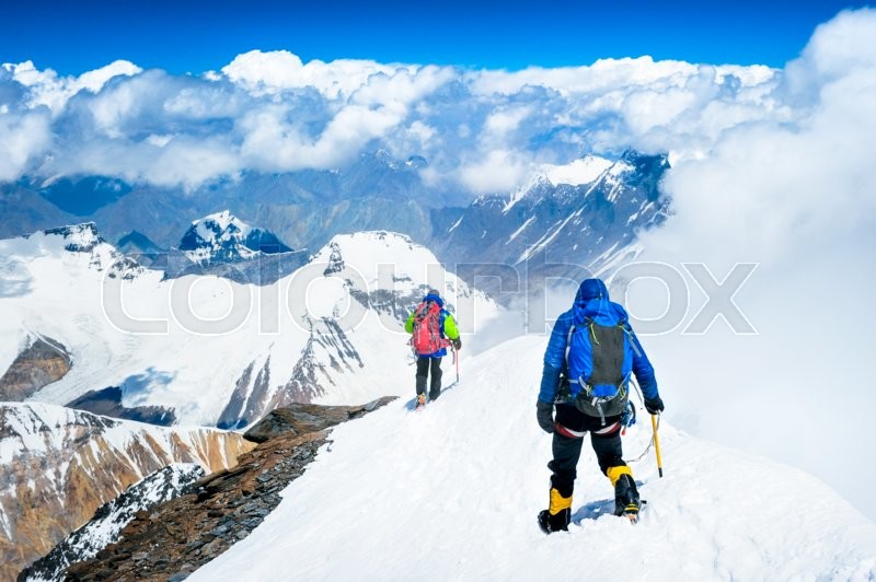 Group of climbers reaching the summit. ... | Stock image | Colourbox