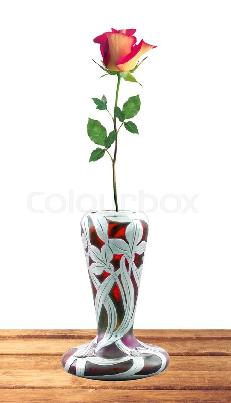 Single Rose In Vase On Table