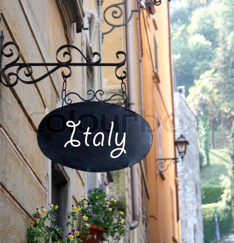 A sign saying "Italy" hanging at a wall ... | Stock image | Colourbox