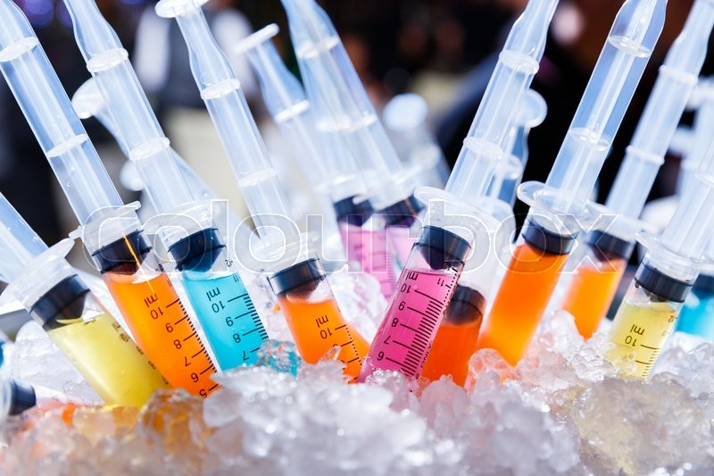 Colorful liquid drug or elixir in ... | Stock image | Colourbox