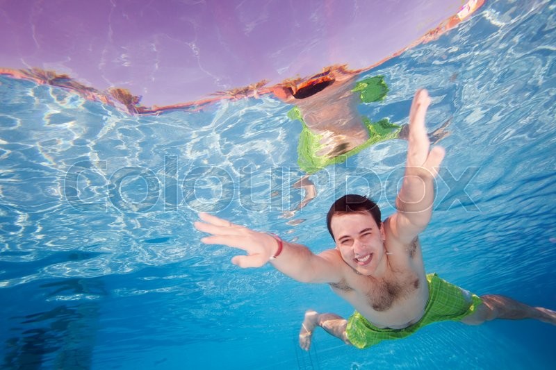 Person Diving Underwater