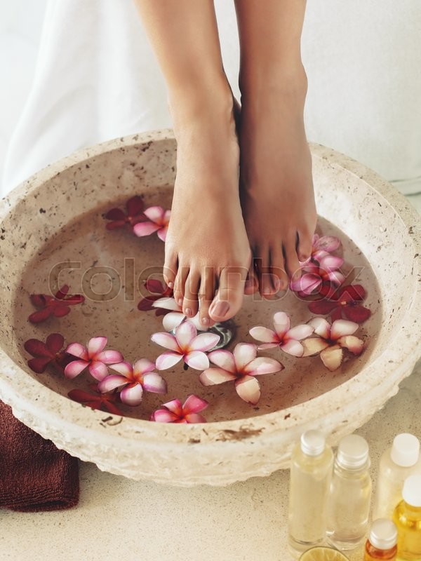 Foot bath in bowl with tropical flowers ... | Stock image | Colourbox