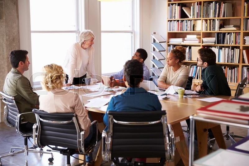 Senior Businesswoman Addressing Team ... | Stock image | Colourbox