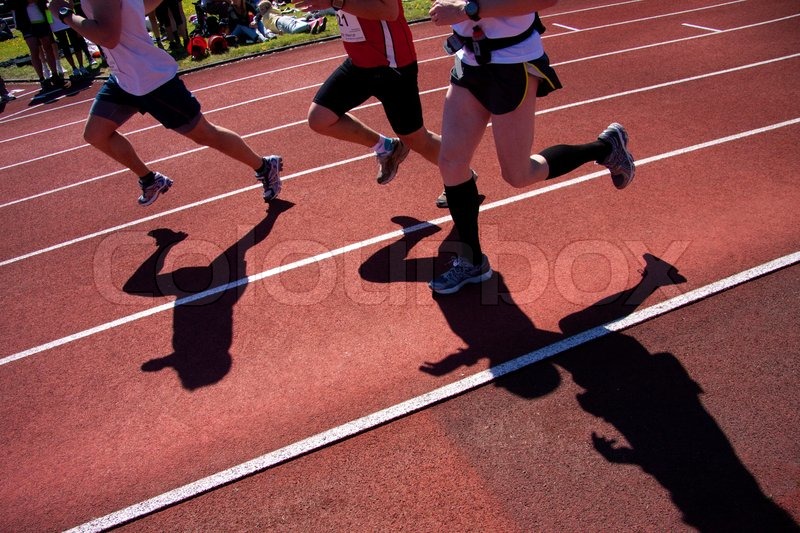 Marathon runners legs and shadows | Stock image | Colourbox