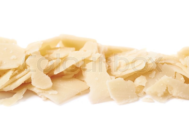Line of parmesan cheese flakes isolated ... | Stock image | Colourbox