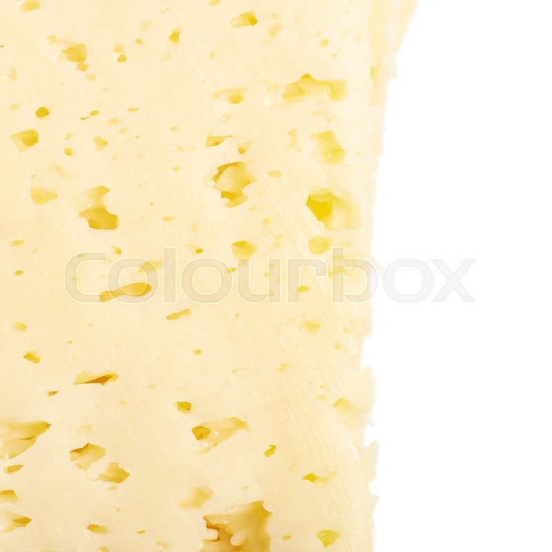 Close-up fragment of a cheese slice ... | Stock image | Colourbox