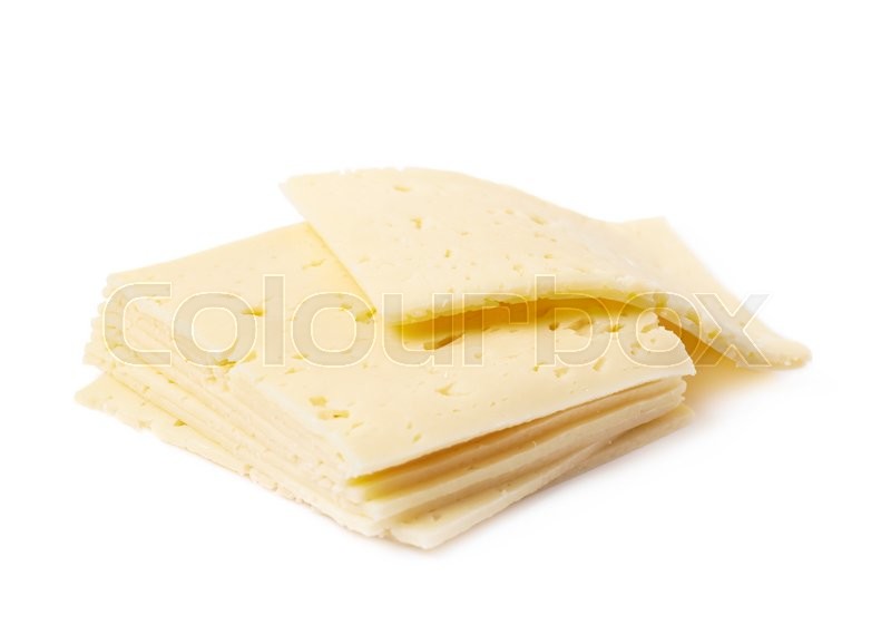 Pile of cheese slices isolated over the ... | Stock image | Colourbox