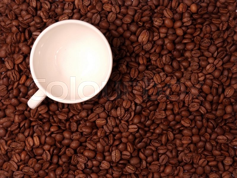 Kaffebønner med kaffekop. Coffeebeans ... | Stock foto | Colourbox