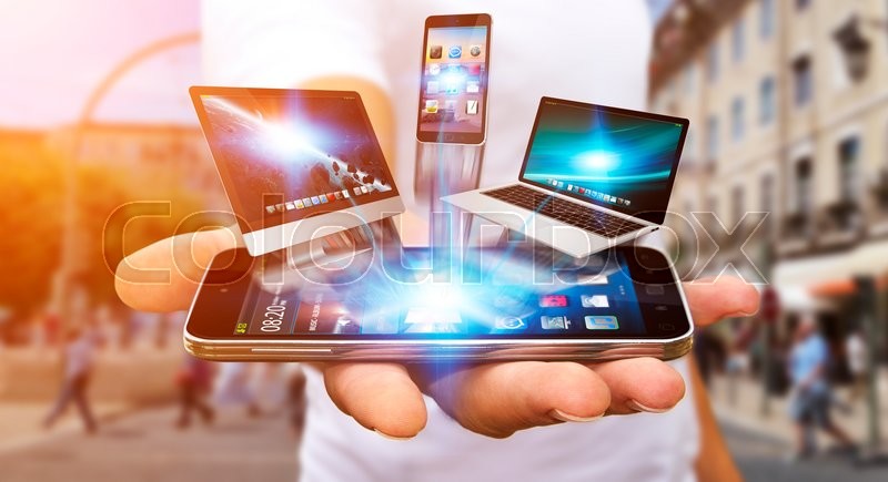 Businessman with computer phone and ... | Stock image | Colourbox