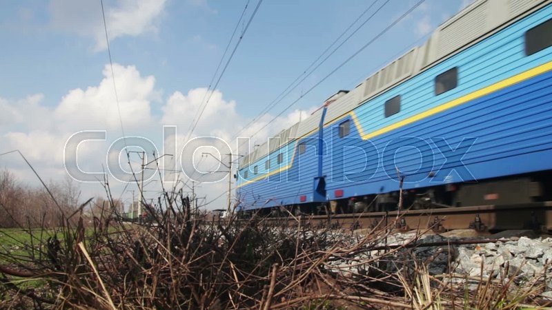Train Rides on Rails. The train moving at a high speed on rails. Full ...