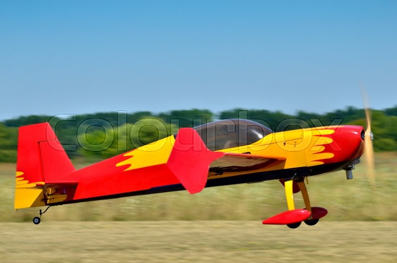 Sports model aircraft takes off from ... | Stock image | Colourbox