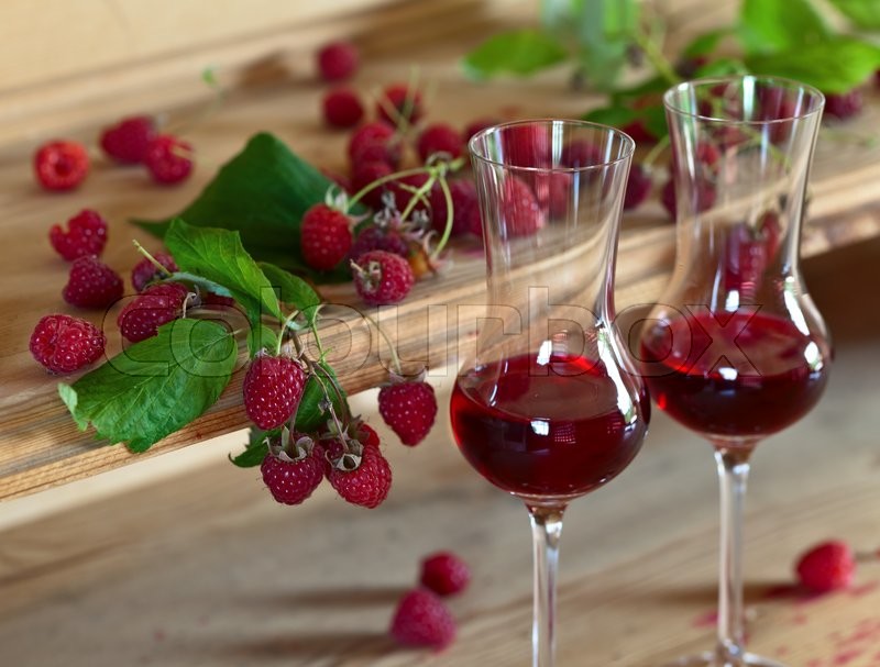 Raspberry wine and ripe berries with ... | Stock image | Colourbox