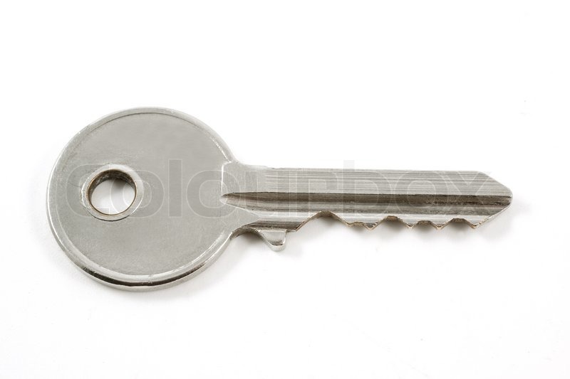 Small key isolated on white background | Stock Photo | Colourbox