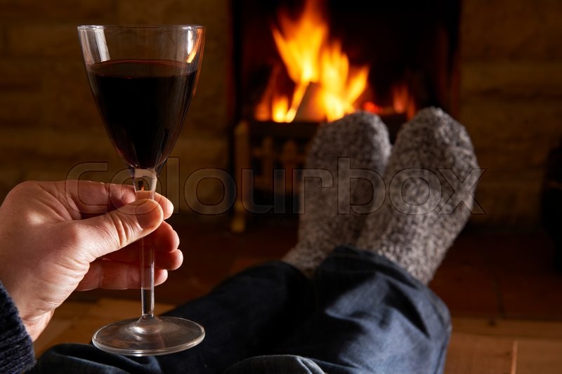 Man With Glass Of Red Wine Relaxing By ... | Stock image | Colourbox