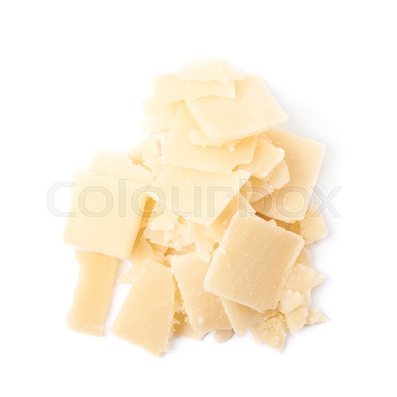 Pile of parmesan cheese flakes isolated ... | Stock image | Colourbox