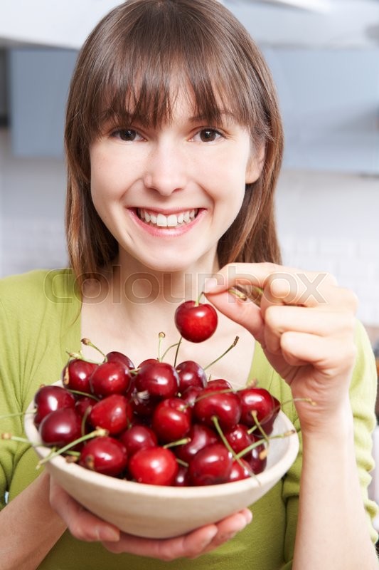 Woman Eating Cherry