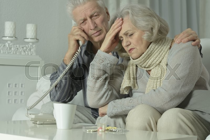 Portrait of sick elderly couple with ... | Stock image | Colourbox