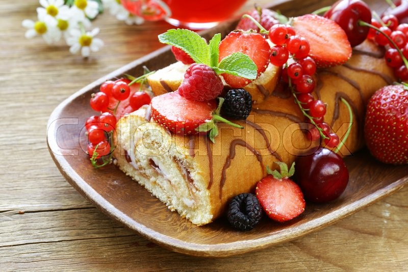 Biscuit roulade with butter cream and ... | Stock image | Colourbox