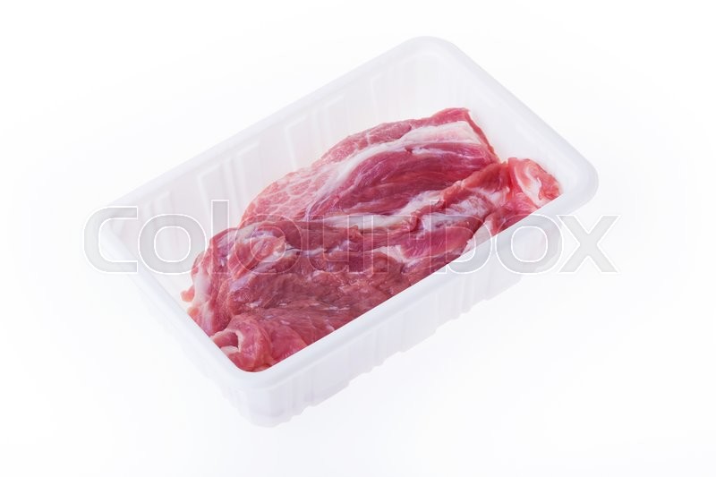 Raw pork in plastic box package ... | Stock image | Colourbox
