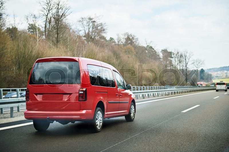 Fast red mini van on highway autobahn ... | Stock image | Colourbox