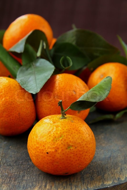 Fresh mandarin orange in a basket on ... | Stock Photo | Colourbox