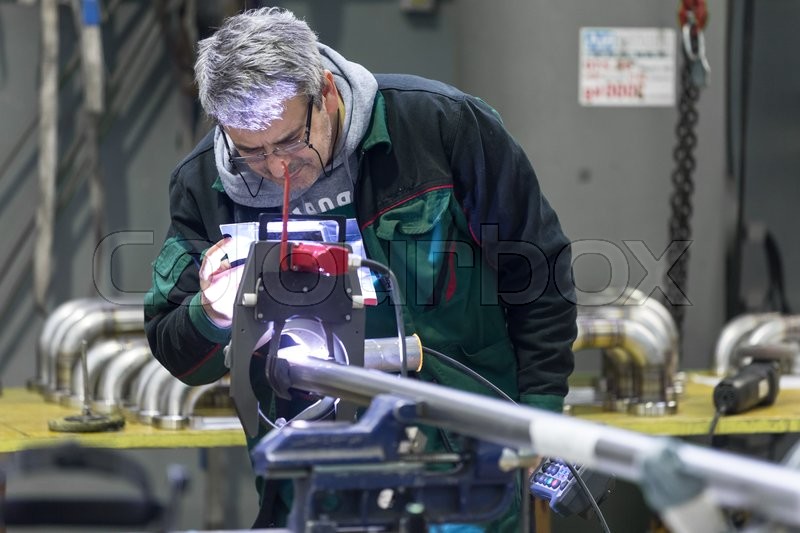 Industrial operator setting computer ... | Stock Photo | Colourbox
