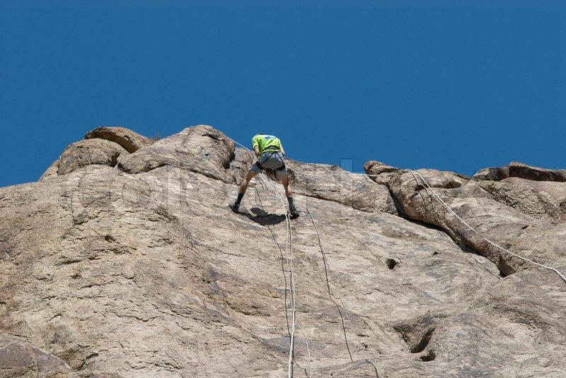 Clamber on cliff | Stock image | Colourbox