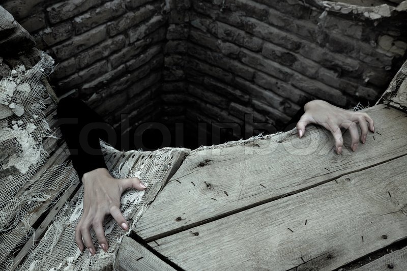 Hands of the person trying to get out ... | Stock image | Colourbox
