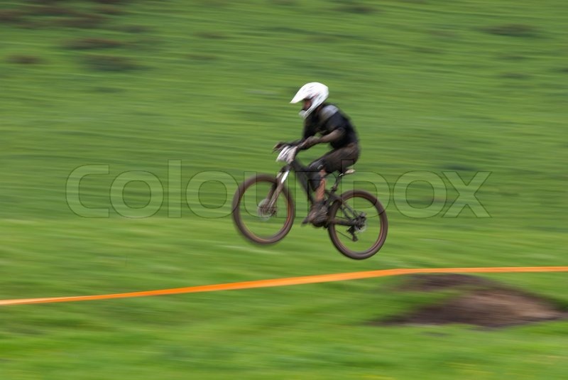 Speed jump motion biker | Stock image | Colourbox
