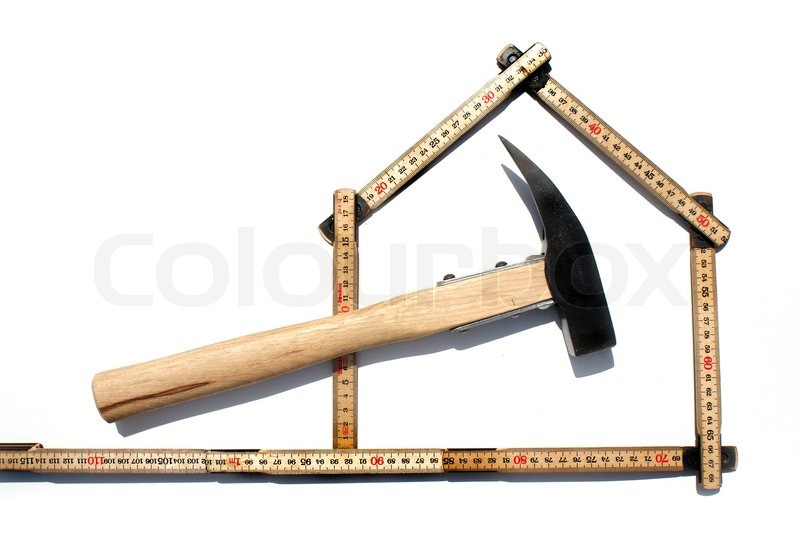 Carpenters folding ruler and hammer | Stock image | Colourbox