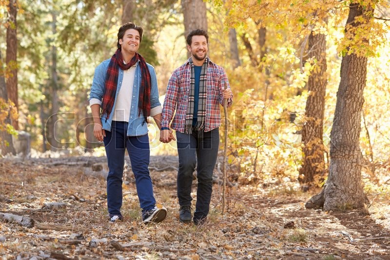 Gay Male Couple Walking Through Fall ... | Stock image | Colourbox