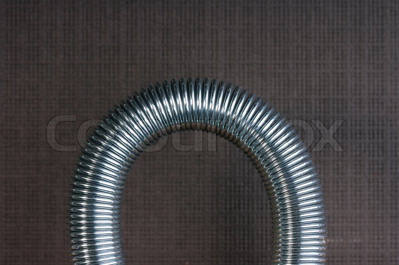 Metal spring deformed on an arch on a ... | Stock image | Colourbox