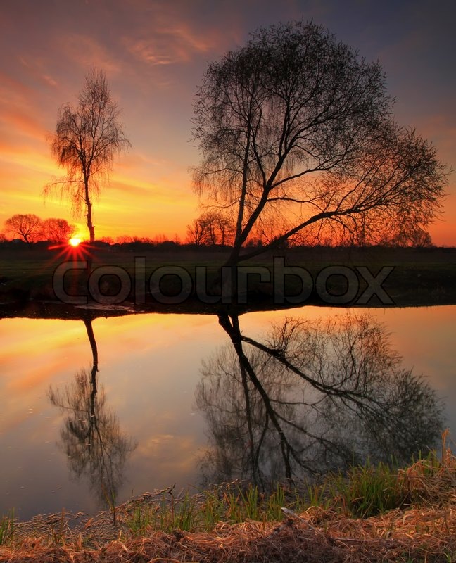 Sunrise on the river | Stock Photo | Colourbox