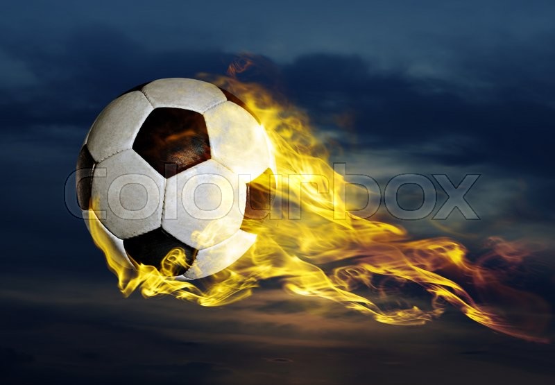 Flying fiery soccer ball in sky | Stock image | Colourbox