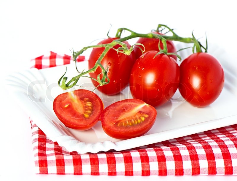 Cherry tomatoes on white plate | Stock image | Colourbox