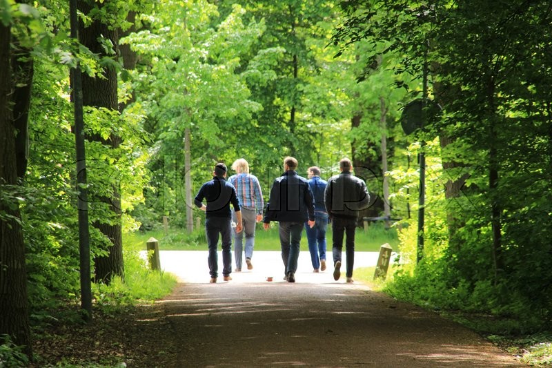 The colleagues are walking in their ... | Stock image | Colourbox