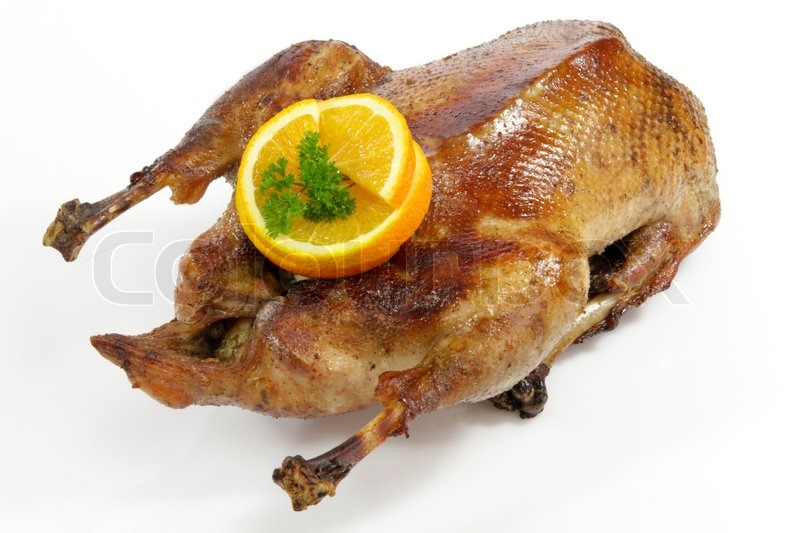 Crunchy fried goose with orange on ... | Stock image | Colourbox