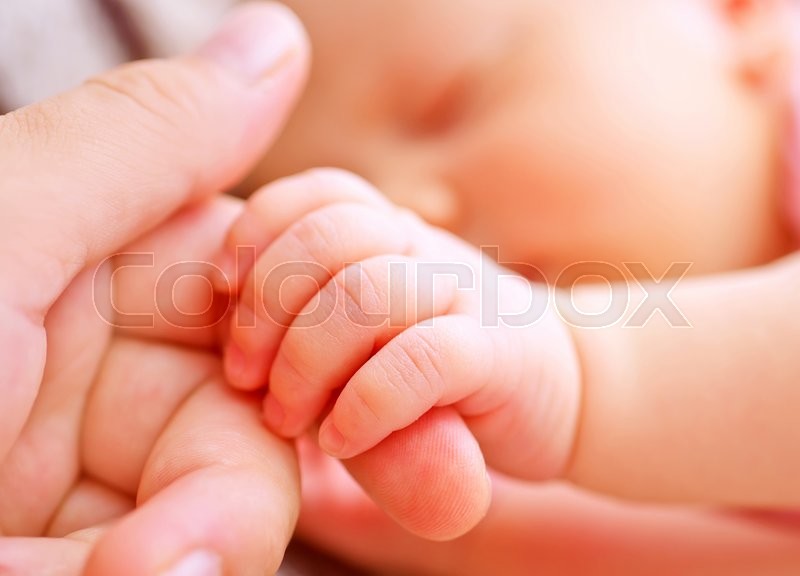 Baby's hand | Stock image | Colourbox