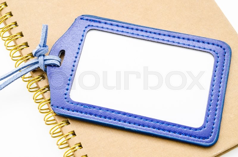 Blank Name Tag on brown diary. | Stock image | Colourbox