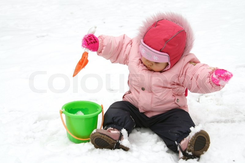Little Baby Playing with Snow in Winter ... | Stock image | Colourbox