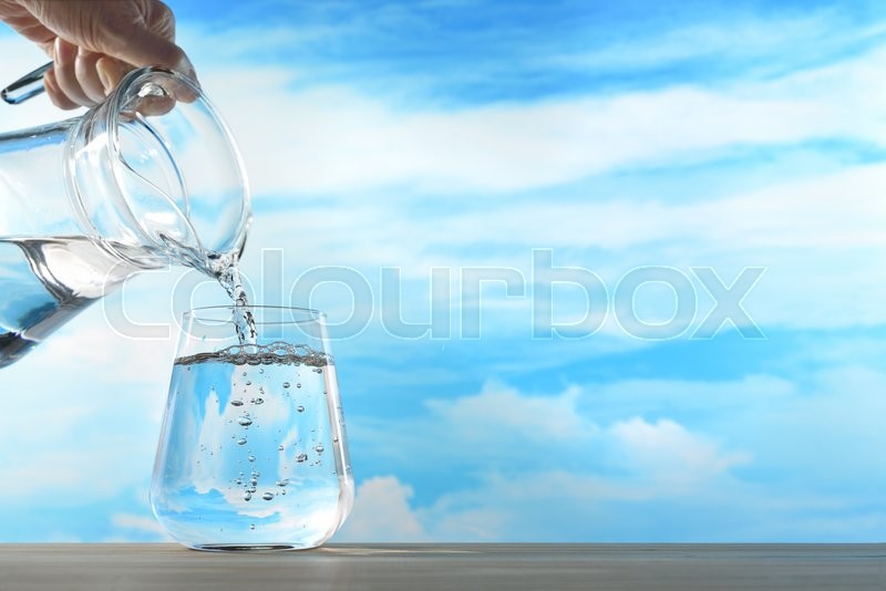 Fresh and clean drinking water being ... | Stock image | Colourbox