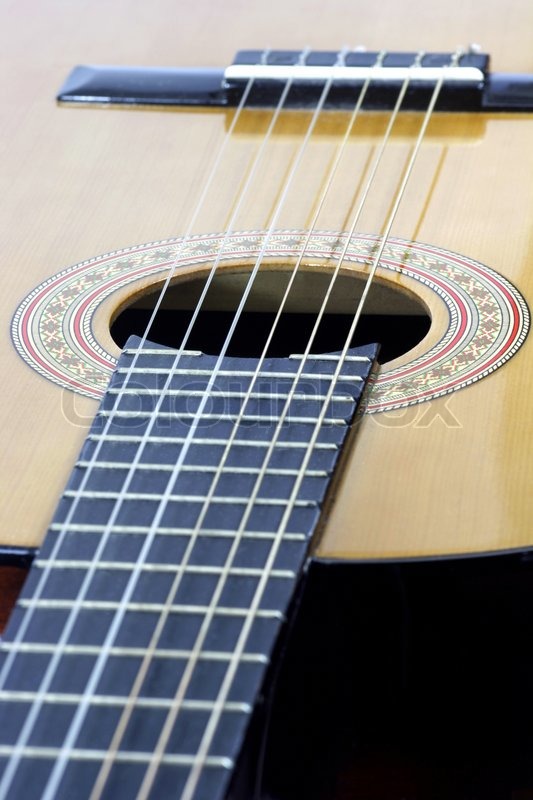 Close up of an acoustic guitar | Stock image | Colourbox