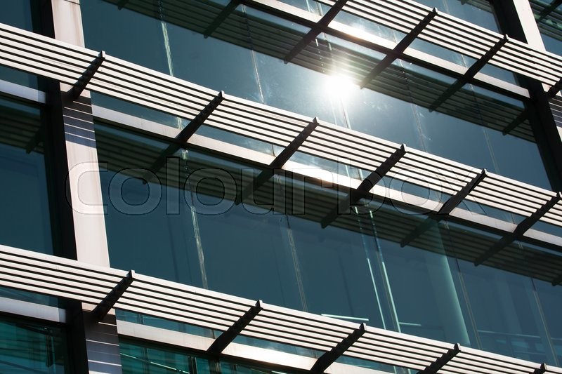 Close-up of glass building with windows ... | Stock image | Colourbox