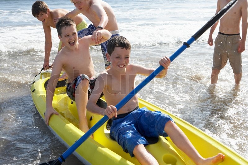 Teenage boys kayaking | Stock image | Colourbox